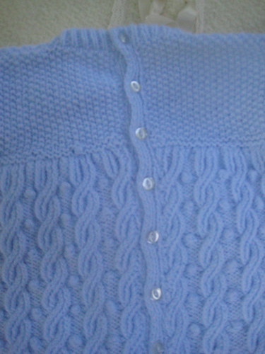 Ravelry: Design D - Cabled All-in-one Romper and Pants pattern by Sirdar