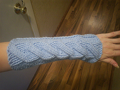 Ravelry: Slow and Easy Cabled Arm Warmer pattern by Heather Gibbs