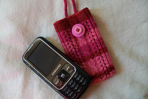 Ravelry: Lacy Cabled Cell Phone Cozy pattern by dicksie12