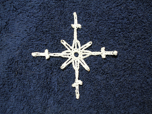 Ravelry: Compass Rose Snowflake pattern by Allison Weaver