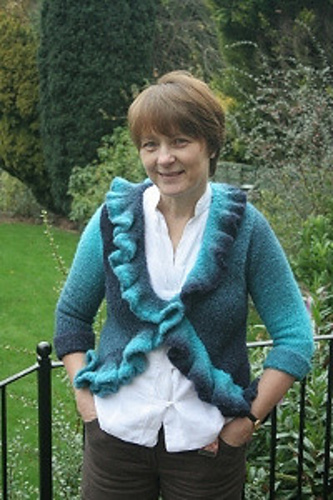Ravelry: Ruffle-Edged Cardigan pattern by Sirdar