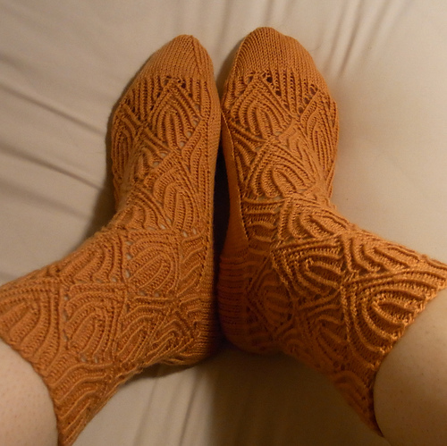 Ravelry: Orange Jubilee Socks pattern by verybusymonkey