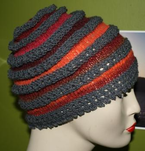 Ravelry: Squishy Eyelet Sock Yarn Hat pattern by Tess Young
