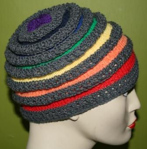 Ravelry: Squishy Eyelet Sock Yarn Hat pattern by Tess Young