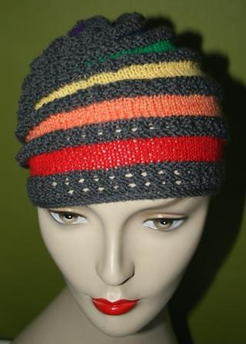 Ravelry: Squishy Eyelet Sock Yarn Hat pattern by Tess Young
