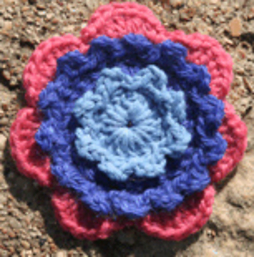 Ravelry: Frilly Target Flower pattern by Suzann Thompson