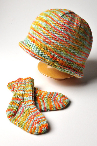 Ravelry: Bebe Hat & Socks pattern by Kristin Spurkland