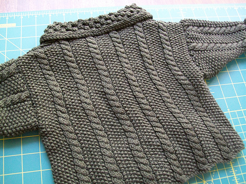 Ravelry: Moss Stitch Cabled Coat pattern by Debbie Bliss