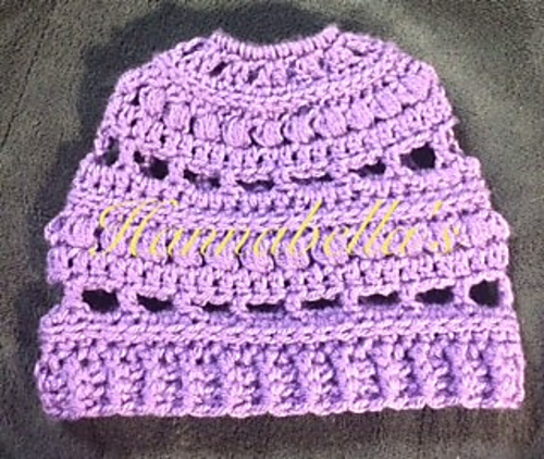 Ravelry: Cancer Messy Bun Beanie pattern by Allie Logsdon