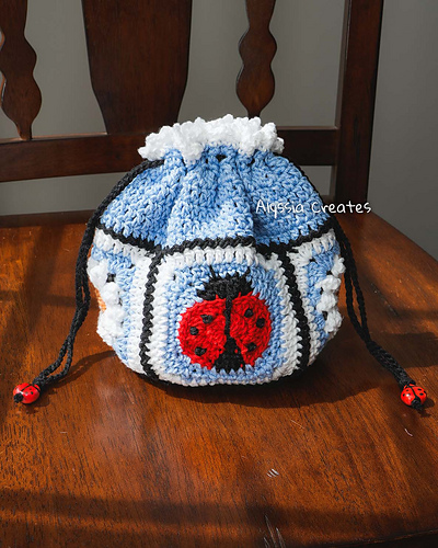 Ravelry: Ladybug and Daisy Drawstring Pouch pattern by Alyssia Stacey-Orchard