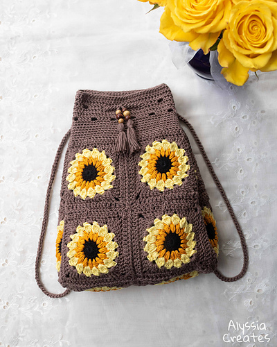 Ravelry: Sunflower Drawstring Backpack pattern by Alyssia Stacey-Orchard