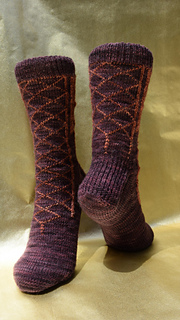 Ravelry: Charmed Diamond Socks pattern by Amelia Archer