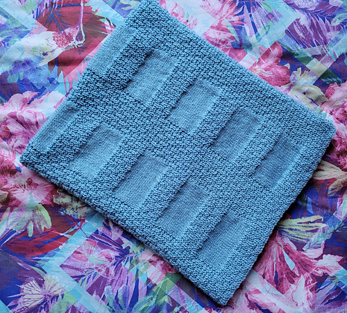 Ravelry: Textured baby cot cover pattern by Annie Reilly