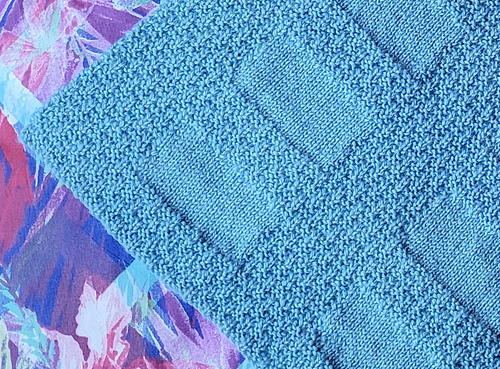 Ravelry: Textured baby cot cover pattern by Annie Reilly