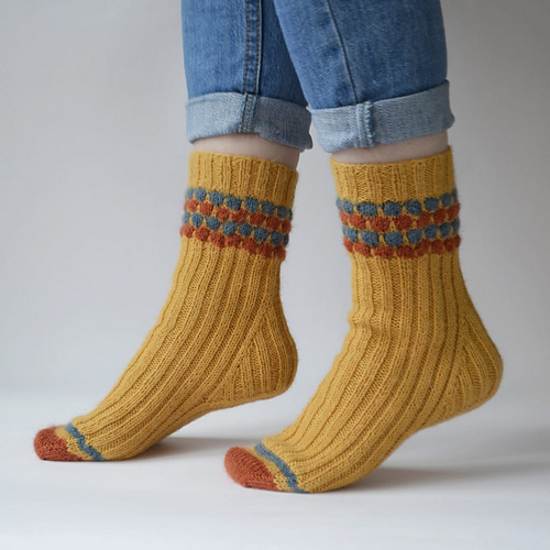 Ravelry: Puff Socks pattern by Anya Zhiltsova