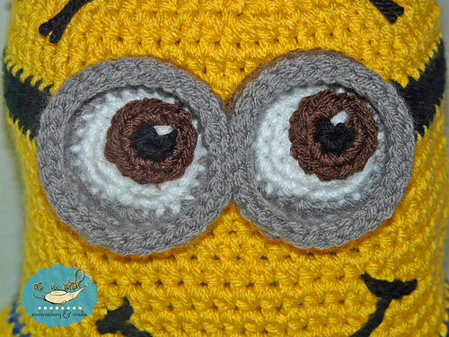 Ravelry: 3-D Minion Ear Flap Hat pattern by Yvette Manley