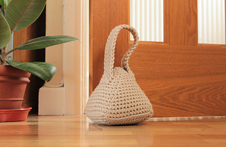 Ravelry: Pyramid Doorstop pattern by Veronika Cromwell