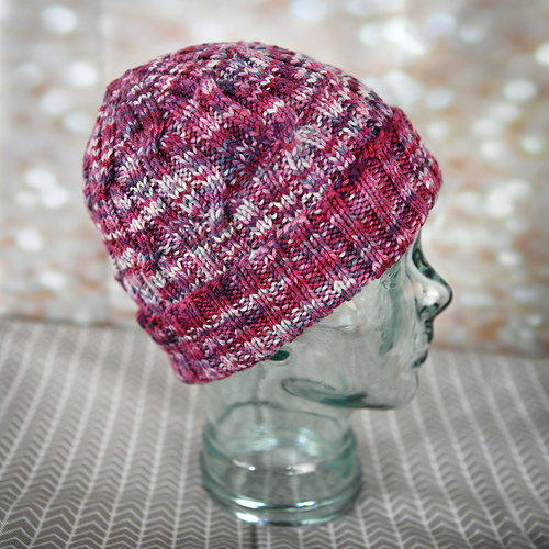 Ravelry: Raspberry Braids Hat pattern by Shannon Dunbabin