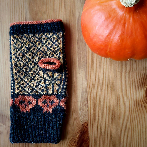 Ravelry: Spooky Pumpkin Mitts pattern by Cat in a Sweater