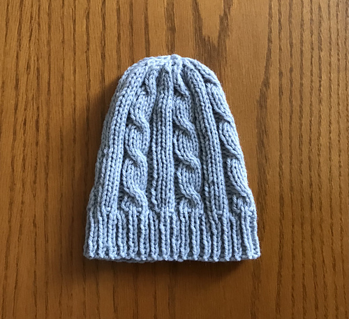 Ravelry: Cabled Baby Hat pattern by marianna mel