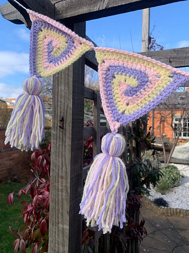 Ravelry: Spiral Springtime Bunting pattern by Fiona Field