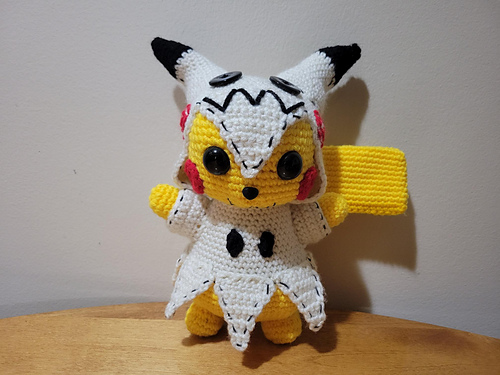 Ravelry: Pikachu in Mimikyu Costume Amigurumi pattern by James Jester