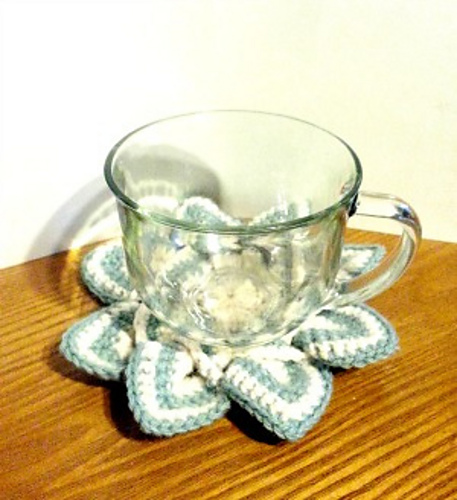 Ravelry: 8-Point Twisted Trivet - Coaster - Hot Pad pattern by Evonne Umbel