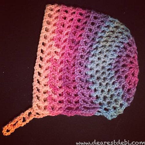 Ravelry: Fuzzy Rainbow Bonnet pattern by Debi Dearest