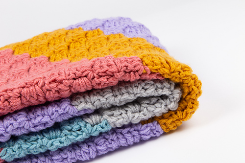 Ravelry: Tropical Stripes Blanket pattern by Kate Rowell