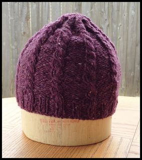 Ravelry: Cabled Watch Cap pattern by Lynette Connors