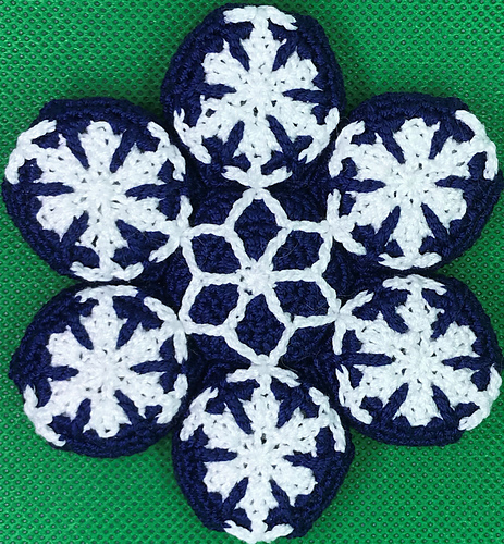 Ravelry: Sparkle Snowflake Bottle Cap Coaster pattern by Emma Garside