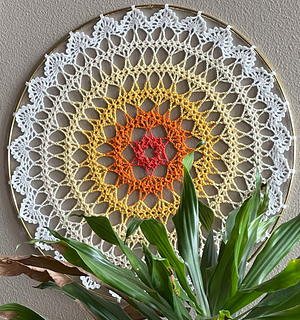 Ravelry: Sunburst Doily pattern by Emma Garside