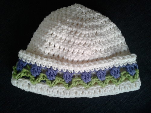 Ravelry: Flowers in the Snow Cuffed Hat pattern by Angela Maria