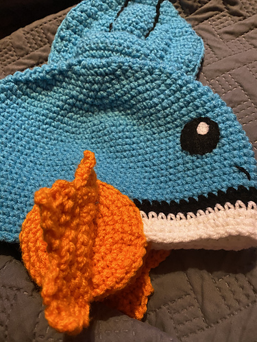 Ravelry: Mudkip Earflap Hat pattern by Melissa Cook