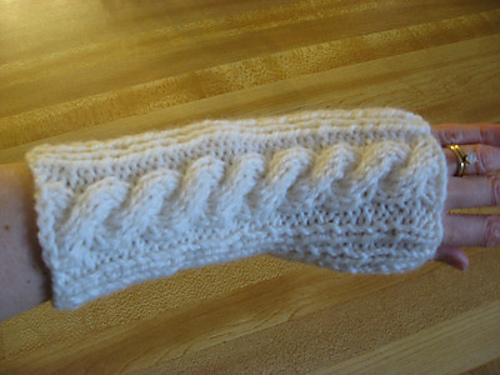 Ravelry: Cabled Wristlets pattern by Lion Brand Yarn