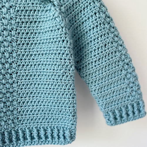 Ravelry: Button Baby Sweater pattern by Hannah Cross