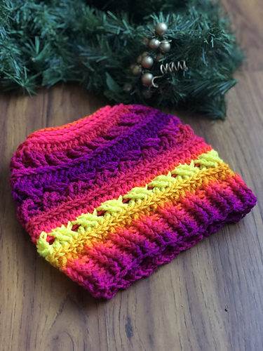 Ravelry: The Sweeney Messy Bun Beanie pattern by Lindsay Allercott
