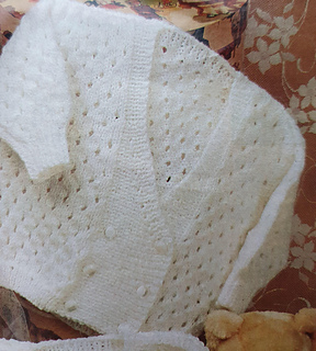 Ravelry: Baby's First Cardigan, Eyelet Patterned pattern by Readicut Wool