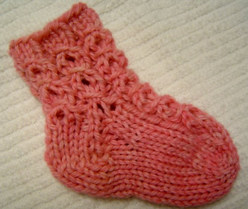 Ravelry: Mock Cable Baby Socks pattern by Janet Gallagher