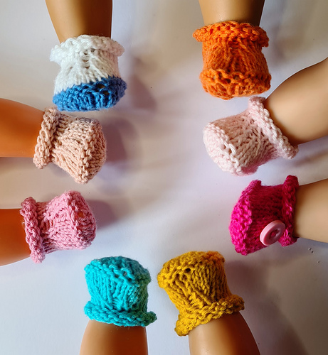 Ravelry: 12 Inch Baby Doll Booties pattern by Jane Terzza