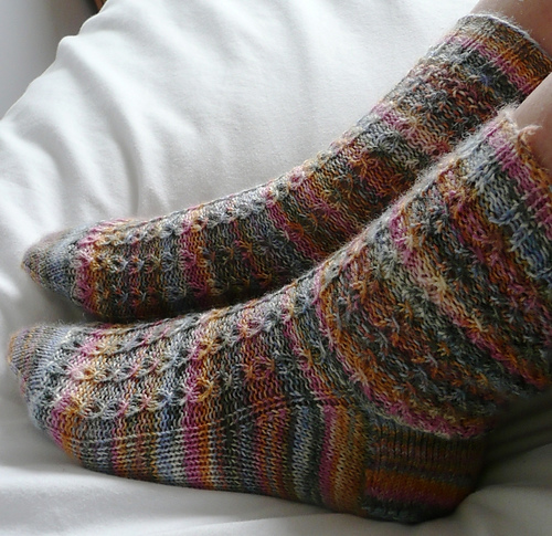 Ravelry: Lacy Mock Cable Socks pattern by Kat (katinkorea)
