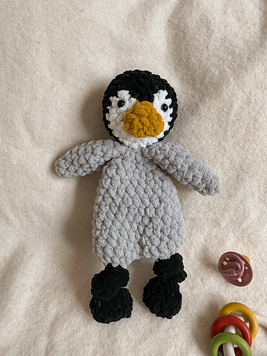 Ravelry: Baby Penguin Snuggler pattern by Juliane Heise