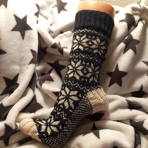 Ravelry: Snowflake Socks pattern by Frederica Patmore