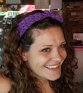 Ravelry: Tie it on top headband pattern by Julz Lovell