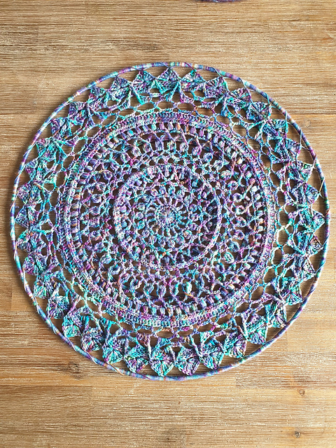 Ravelry: Paua Shell Mandala pattern by Kate Made It