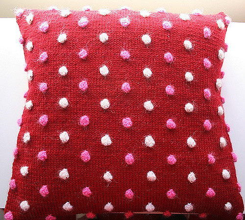 Ravelry: Contrast-bobble Cushion pattern by Caroline Birkett