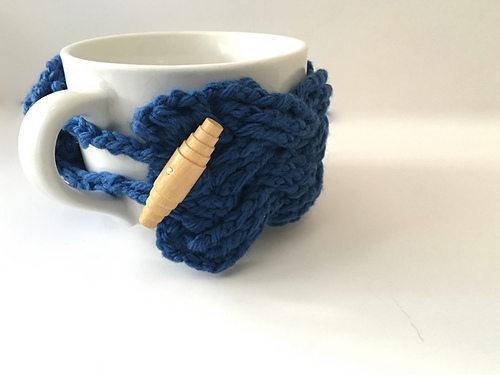 Ravelry: Triple Cable Coffee Cup Cozy pattern by Kristin Omdahl