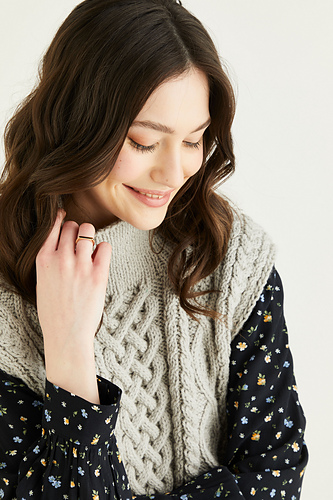 Ravelry: 10319 Funnel Neck Tie Vest pattern by Hayfield