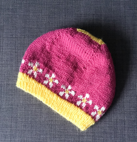 Ravelry: Cheery Daisy Beanie pattern by Kathrine Fyson