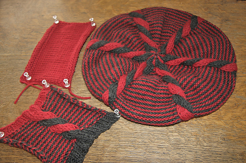 Ravelry: Two-Color Cable Cap pattern by MarinJaKnits